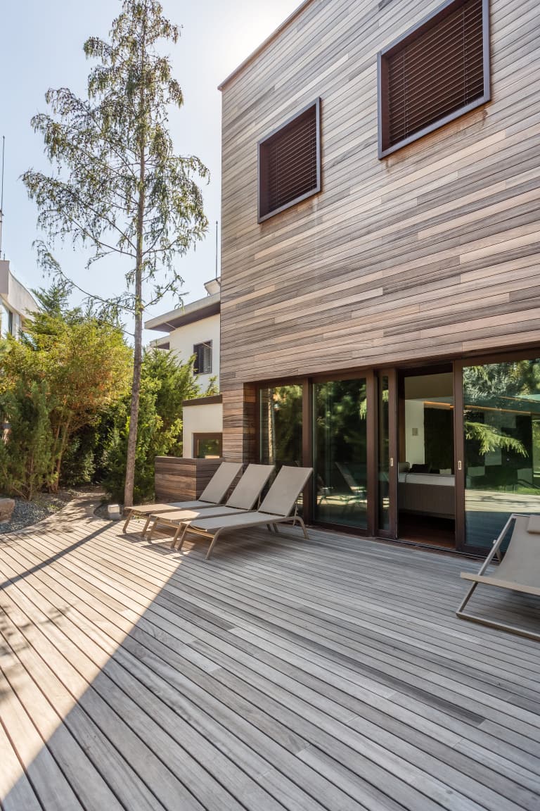A Techniclic cladding and a Softline wood decking on a single house ...